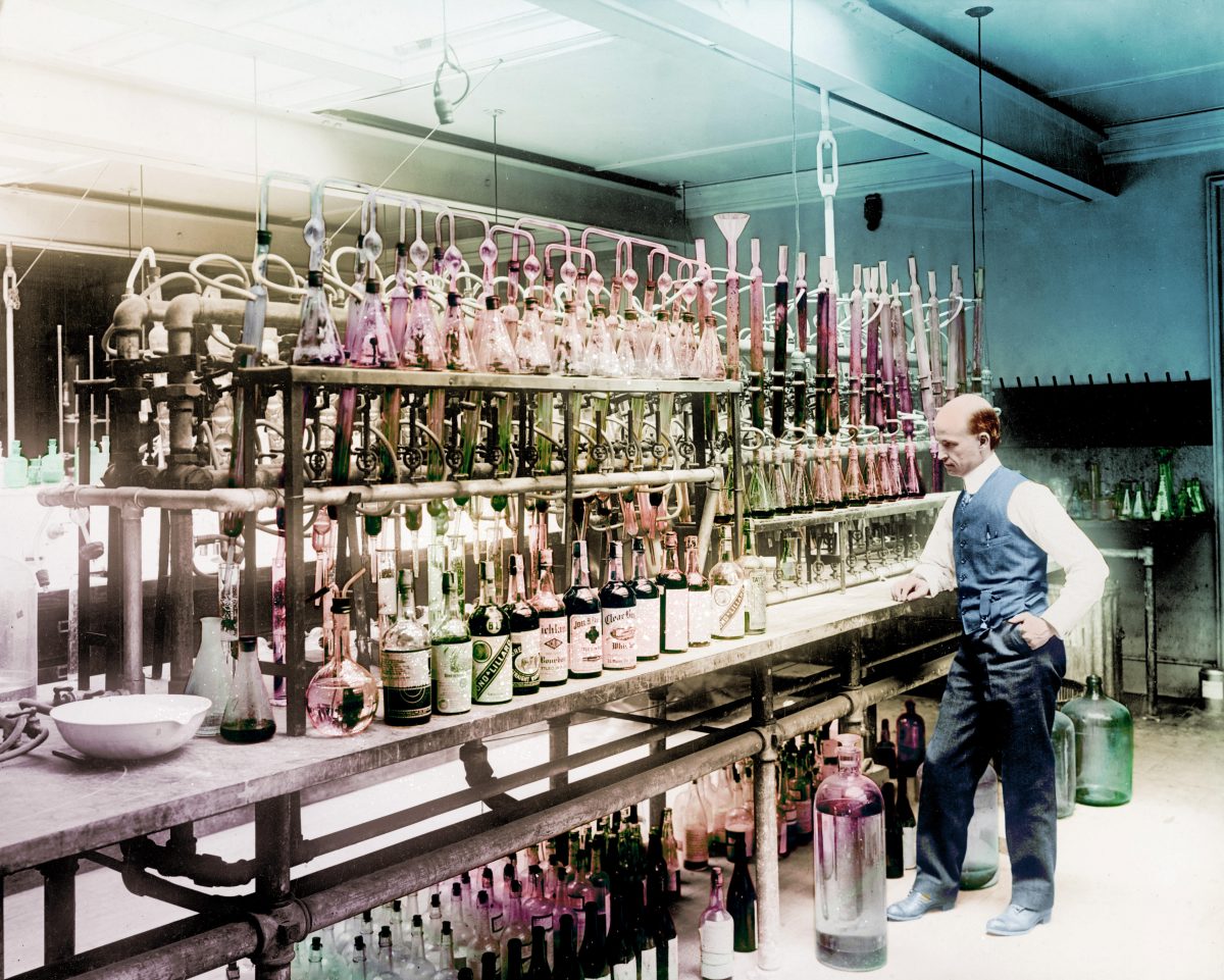 HRP5JX Prohibition Chemist Tests Bootleg Whiskey, 1920 — The Boozehound©